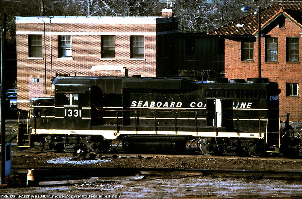 Seaboard Coast Line GP30 #1331, with the engine compartment door open, stopped in front of the ...